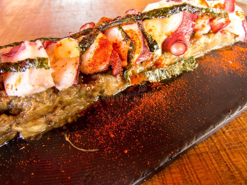 Grilled octopus sandwich stock photo. Image of italian - 228873162