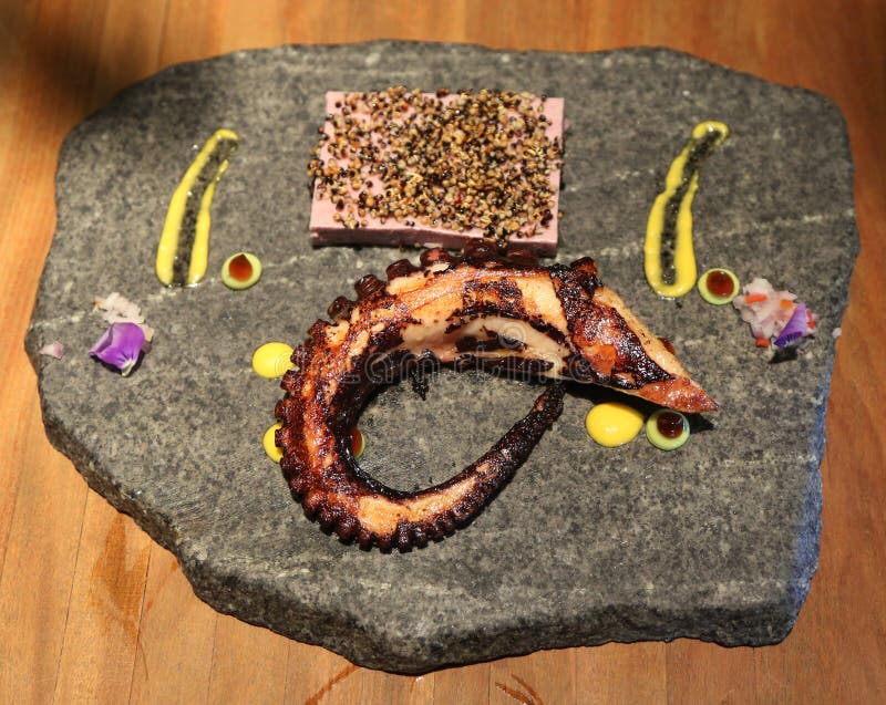 Grilled Octopus Served in Gourmet Restaurant Stock Photo - Image of ...