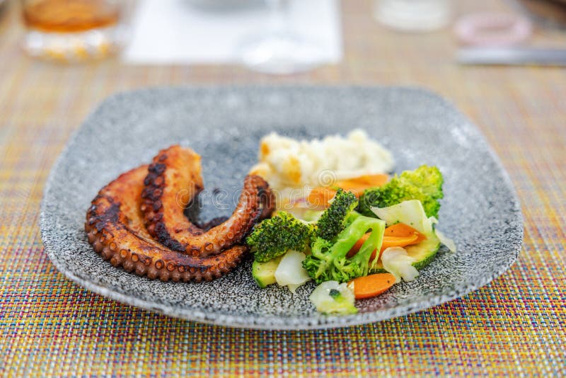 Grilled Octopus Served with Steamed Vegetables and Mashed Potatoes on ...