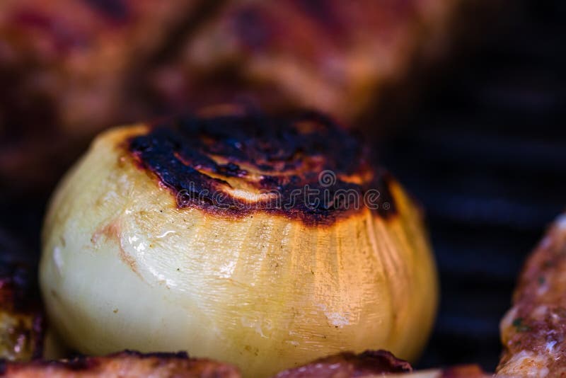 Grilled Onion on a Charcoal Barbeque. Onion on BBQ Stock Image - Image ...
