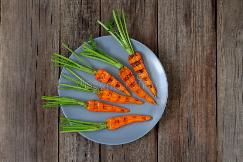 Grilled Organic Carrots on Rustic Table from Above Stock Photo - Image ...