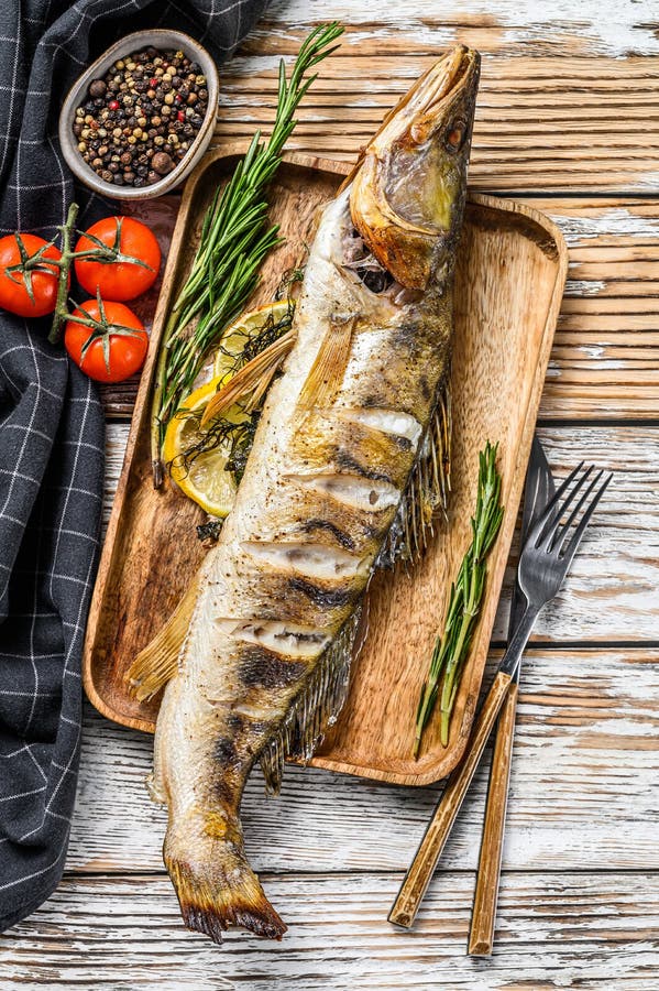 Raw Pike Perch, Pikeperch Fish on a Cutting Board. Fresh Fish. White ...