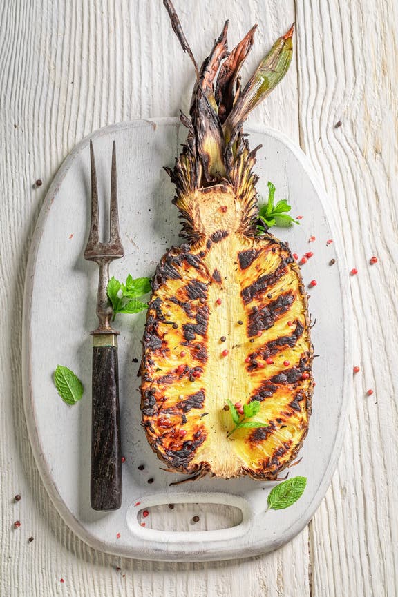 Grilled Pineapple with Mint and Red Pepper Stock Photo - Image of ...