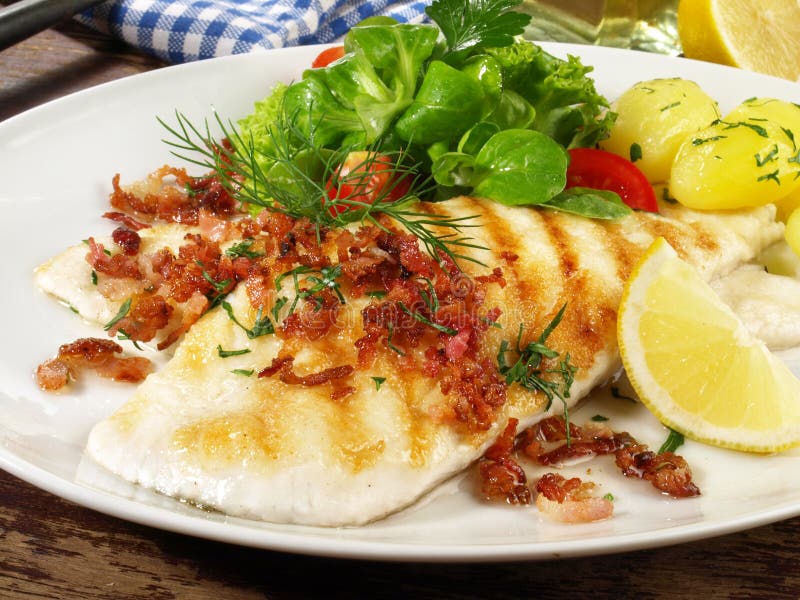 Grilled Plaice Fish Fillet with Bacon and Lemon Stock Image - Image of ...