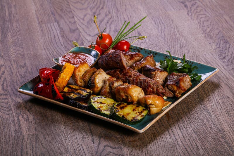 Grilled plate mix stock photo. Image of beef, green - 128525606