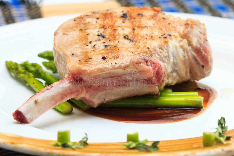 Grilled pork chops stock image. Image of fillet, lunch - 34561173