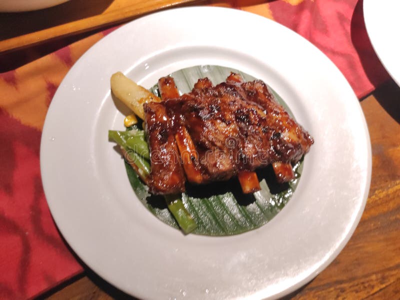 Grilled Pork Ribs, Served on a White Plate Stock Image - Image of plate ...