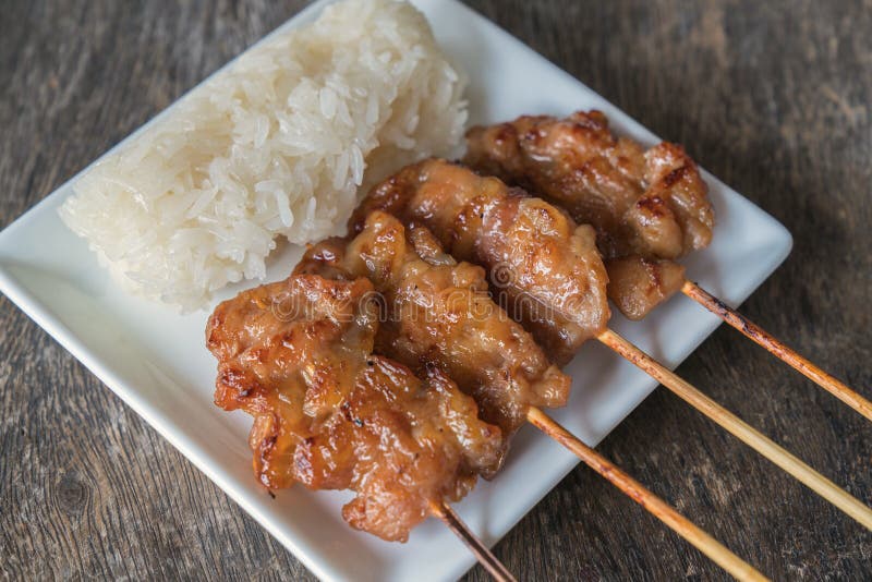 Grilled Pork with Sticky Rice Stock Photo - Image of pepper, grill ...