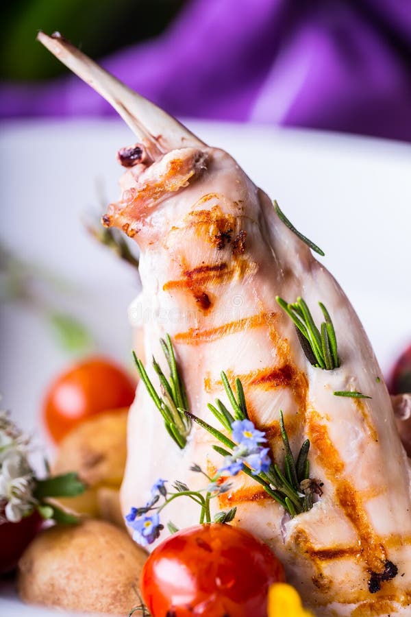 Grilled Rabbit Leg with Rosemary and Vegetable Decoration Stock Image ...