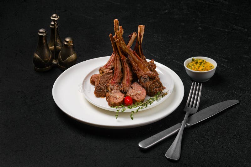 Grilled Rack of Lamb on a Plate Stock Photo - Image of pepper ...