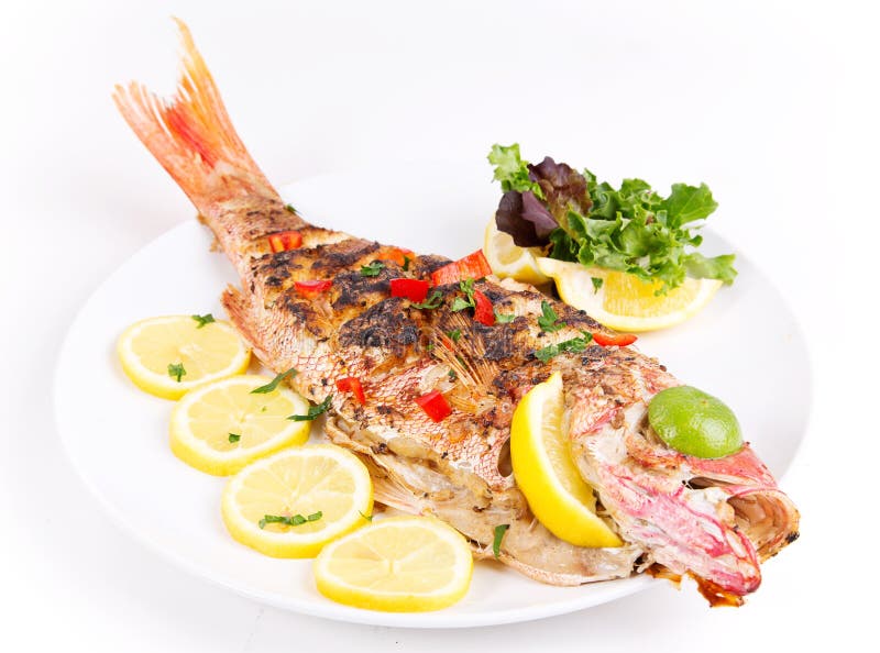 Grilled Red Snapper with Lemon Stock Image - Image of grill, snapper ...