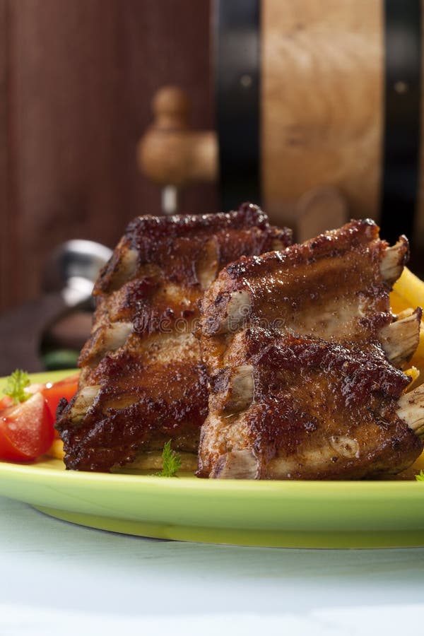 Grilled ribs on plate stock photo. Image of american - 190668352