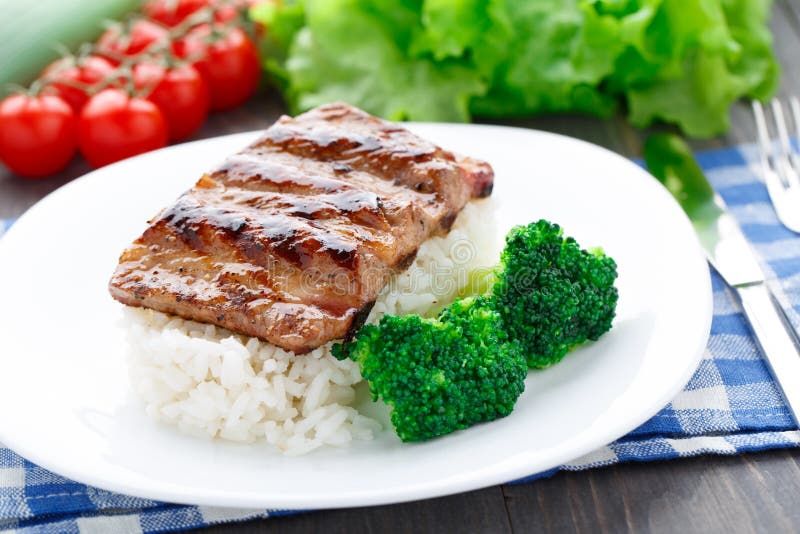 Grilled Ribs with Rice and Broccoli Stock Image - Image of pork, grill ...