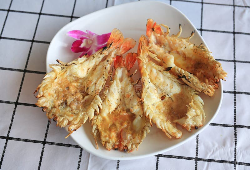 Grilled River Prawn with Butter in White Plate on the Table. Top View ...