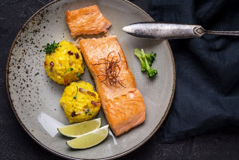 Grilled Salmon Fillet with Saffron Risotto Stock Image - Image of ...