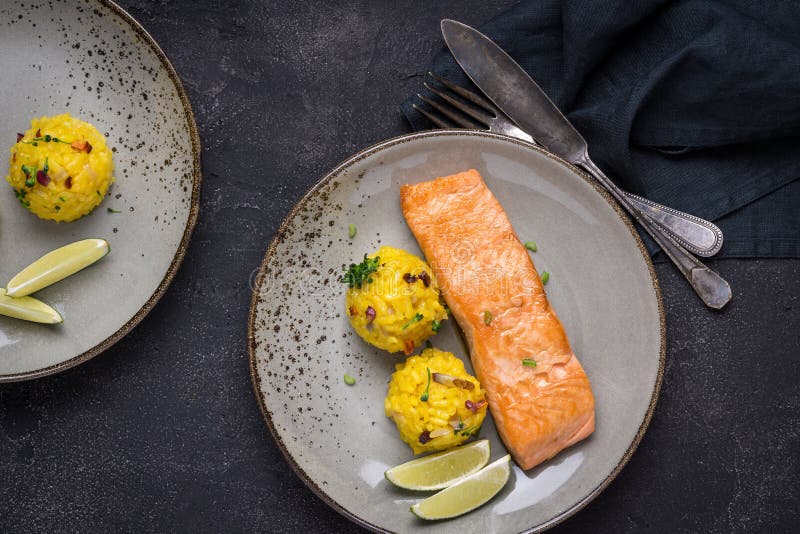 Grilled Salmon Fillet with Saffron Risotto Stock Photo - Image of ...