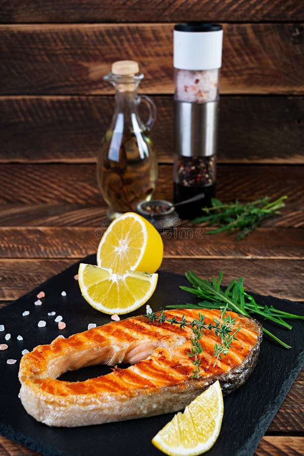 Grilled Salmon Fish on Stone Board. Salt Atlantic Salmon Fried on Grill ...