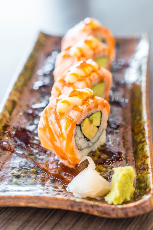 Grilled salmon sushi roll stock photo. Image of asia - 96549800