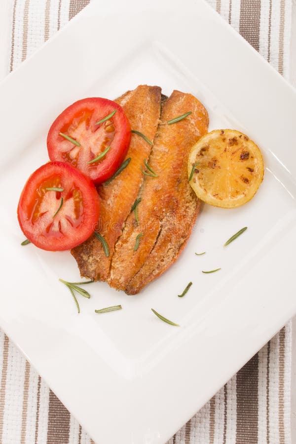 Grilled Kipper with Oat Bran in a Cast Iron Pan Stock Photo - Image of ...