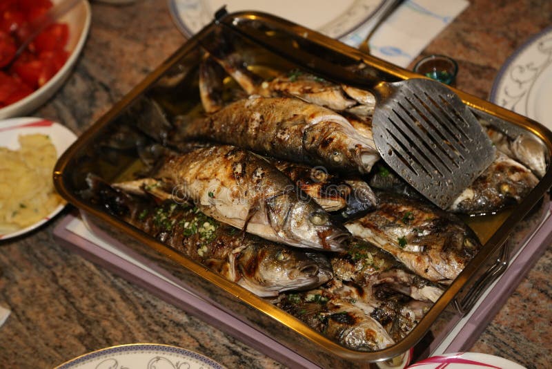 Grilled Sea Fish Stands on the Table Stock Image - Image of gourmet ...