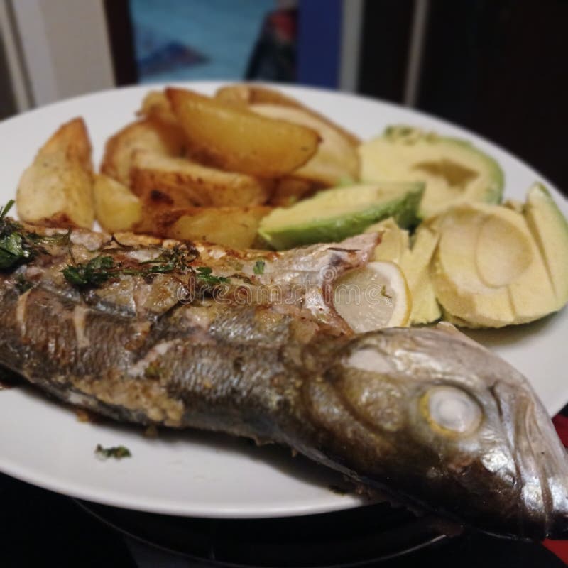 Fish Dinner stock photo. Image of food, meal, animal - 344079192