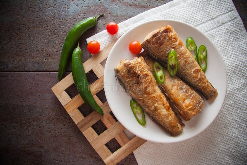 Grilled shad with tomato stock image. Image of dinner - 70437539