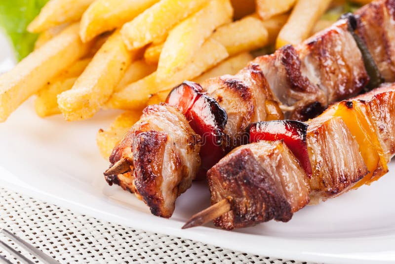 Grilled Shashlik with Chips Stock Image - Image of barbecue, french ...
