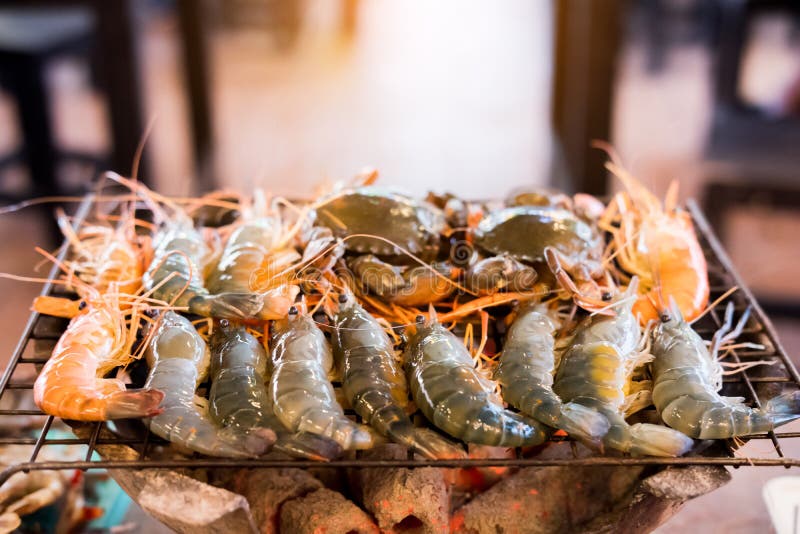 Grilled Shrimp and Crab on the Flaming Grill Stock Image - Image of ...