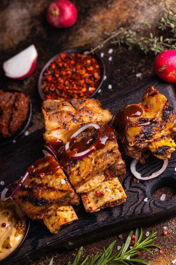 Grilled and smoked ribs. stock image. Image of barbeque - 207709761