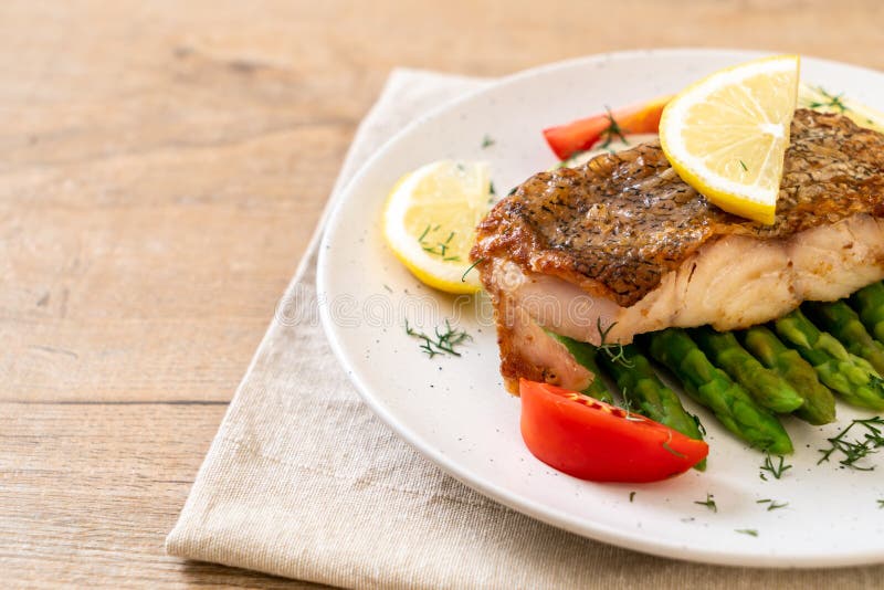 Grilled snapper fish steak stock photo. Image of fried - 153953236