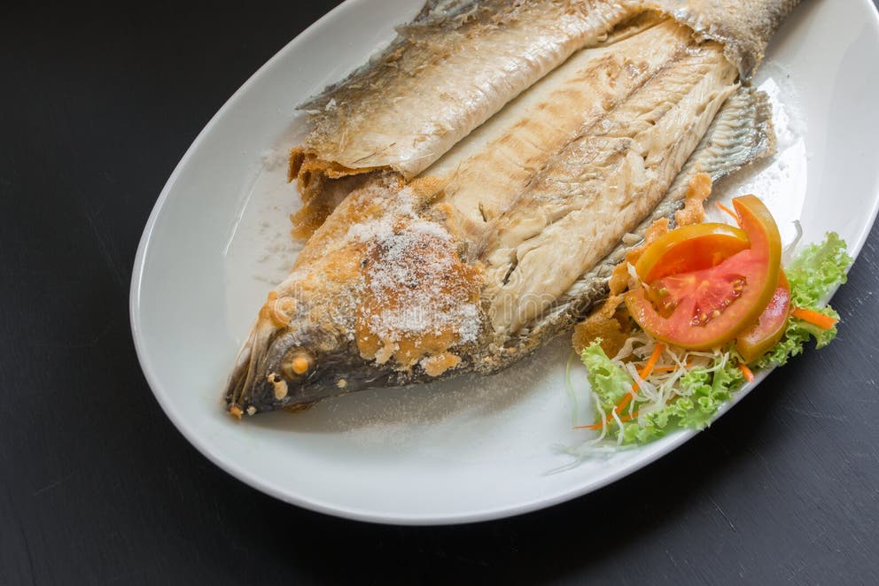 Grilled snapper with salt stock image. Image of lunch - 64032823