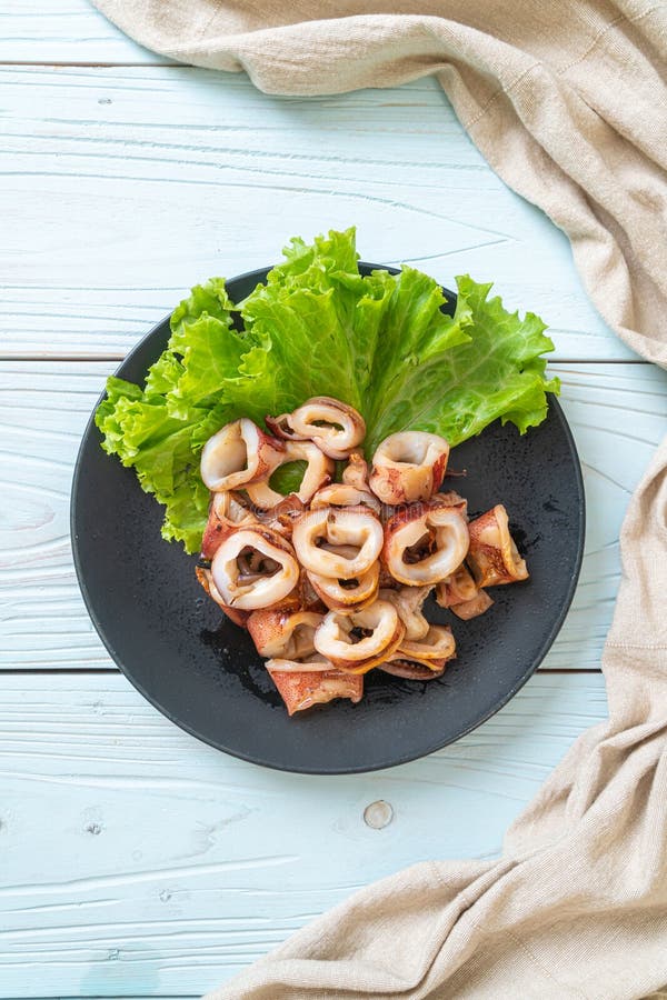 Grilled squid on plate stock image. Image of asian, closeup - 167756651