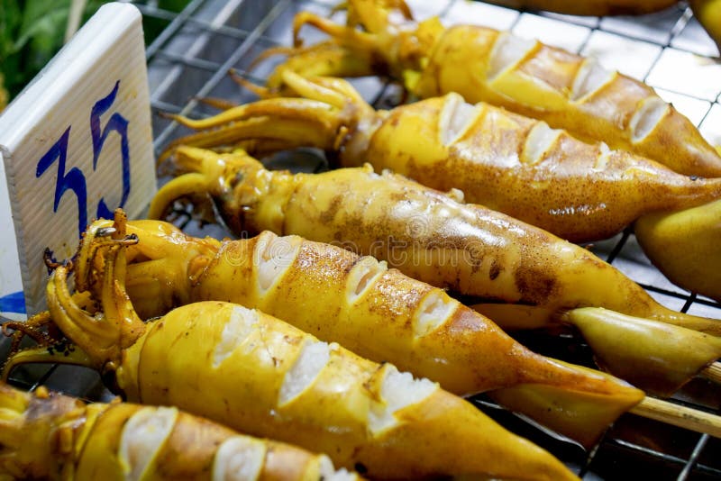 Grilled squid with stick stock photo. Image of cooking - 90654304