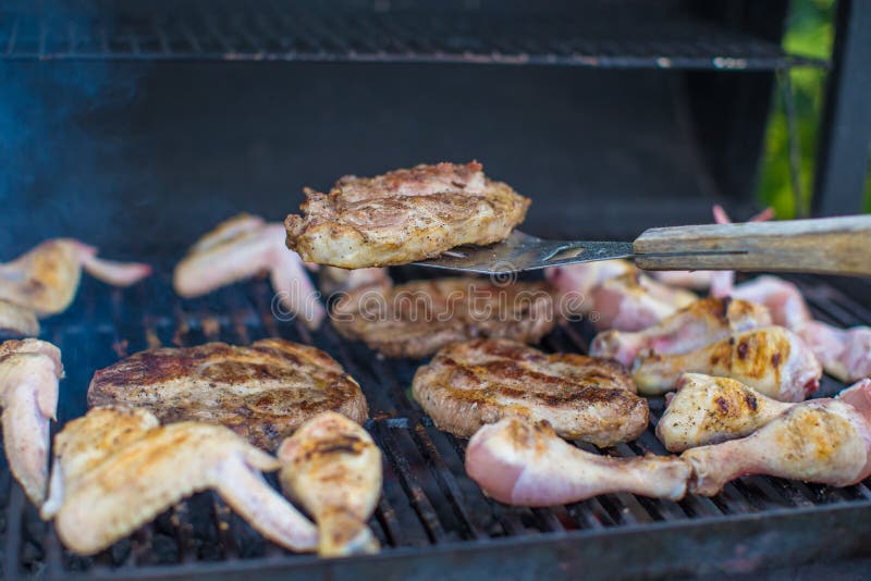 Grilled Steak Cooking on an Open Barbecue Stock Photo - Image of coal ...