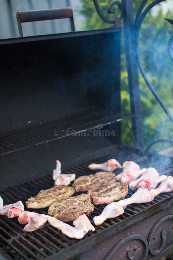 Grilled Steak Cooking on an Open Barbecue Stock Photo - Image of color ...