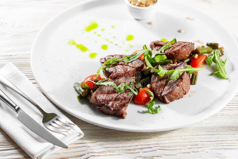 Grilled Steak Delicious Beef Meat on a White Plate on a Light ...