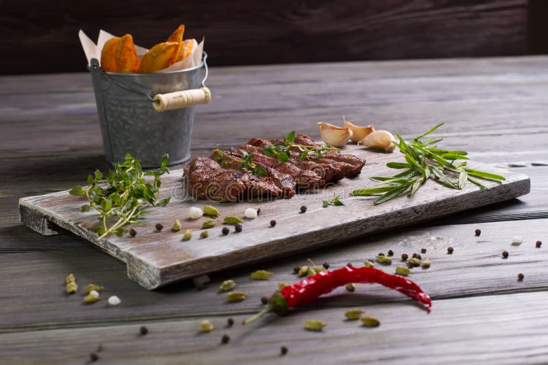 Grilled Steak with Fried Potatoes. Stock Photo - Image of cooked ...