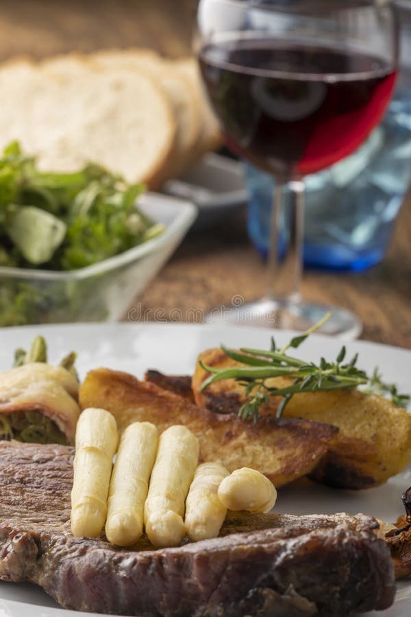 Steak with asparagus stock photo. Image of gravy, food - 134531634 Steak with asparagus stock photo. Image of gravy, food - 134531634