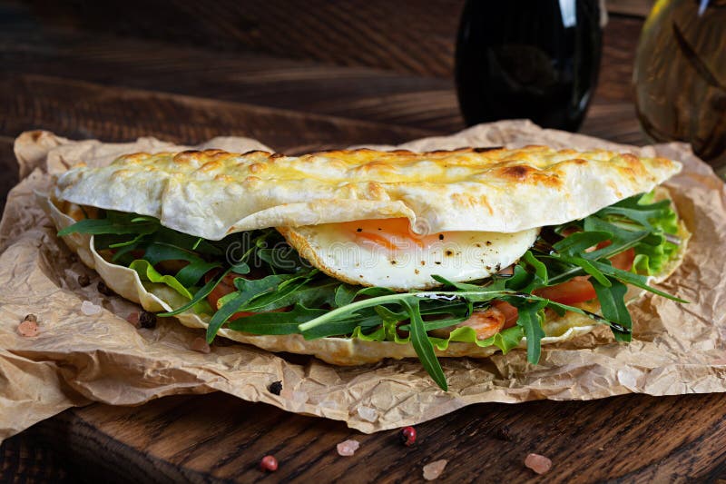 Grilled Stuffed Lavash with Herbs, Tomato and Egg. Lavash Sandwich ...