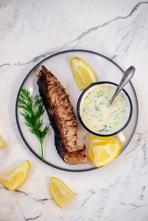 Grilled Sturgeon with Tartare Sause. .style Hugge Stock Photo - Image ...