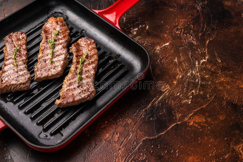 Grilled Tri Tip Steaks, Marbled Beef Meat on Pan with Herbs. Brown ...