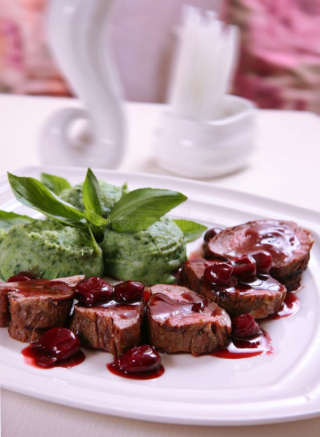 Veal meat with peas stock image. Image of italy, restaurant - 135457025