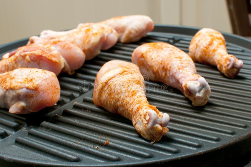 Grilling Chicken Legs Outside Stock Photo - Image of griddle, grease ...