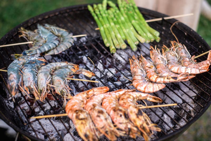 Grilling Large King Prawns. Charcoal-grilled Shrimp Stock Image - Image ...