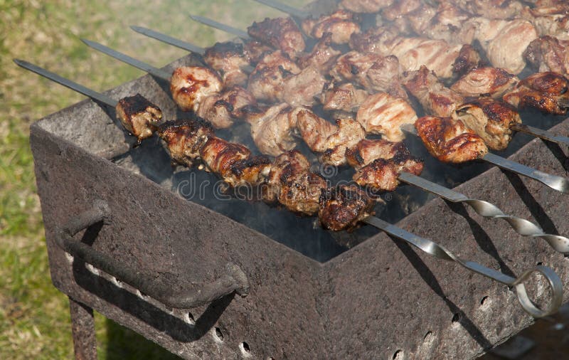 Grilling Marinated Meat on a Brazier Stock Photo - Image of lamb, fried ...