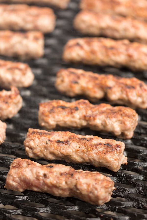 Grilling Minced Meat Kebabs on the Barbecue with Selective Focus Stock ...