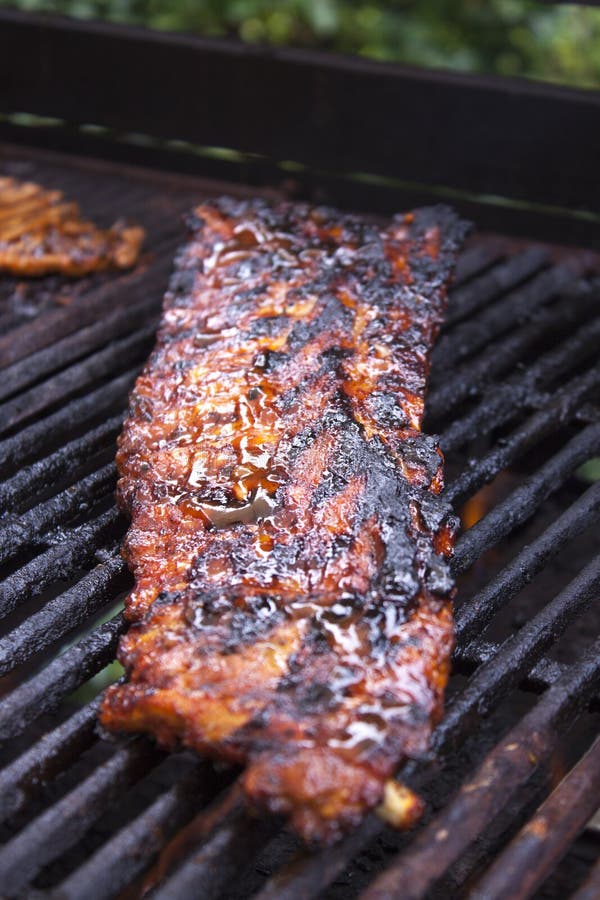 Grilling pork loin ribs stock photo. Image of grilled - 71650666