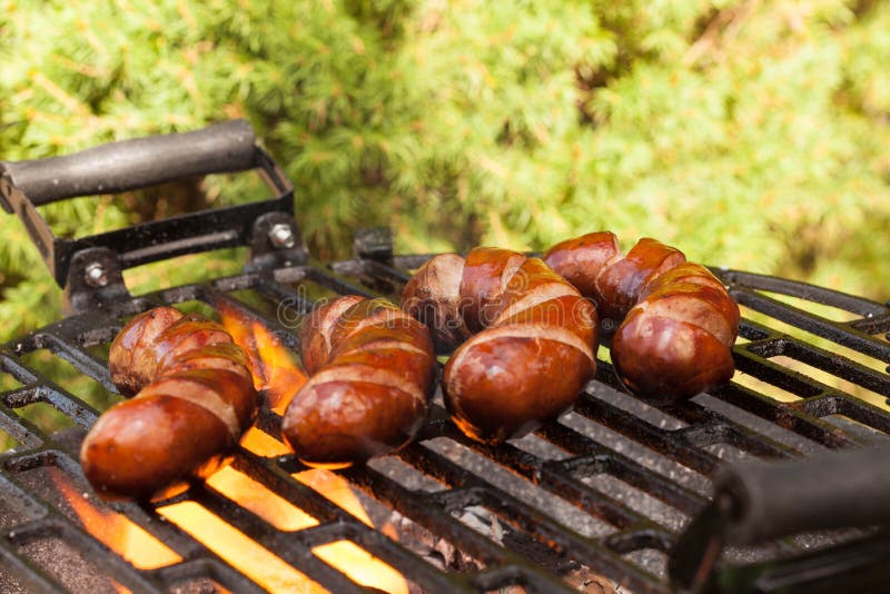 Grilling sausages stock photo. Image of cooking, grill - 181267086