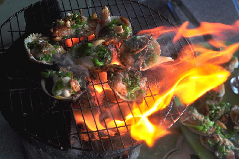 Grilling Shellfish and Seafood on Hot Fire Stock Photo - Image of ...