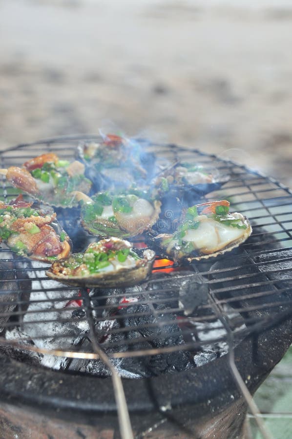 Grilling Shellfish and Seafood on Hot Fire Stock Photo - Image of fish ...